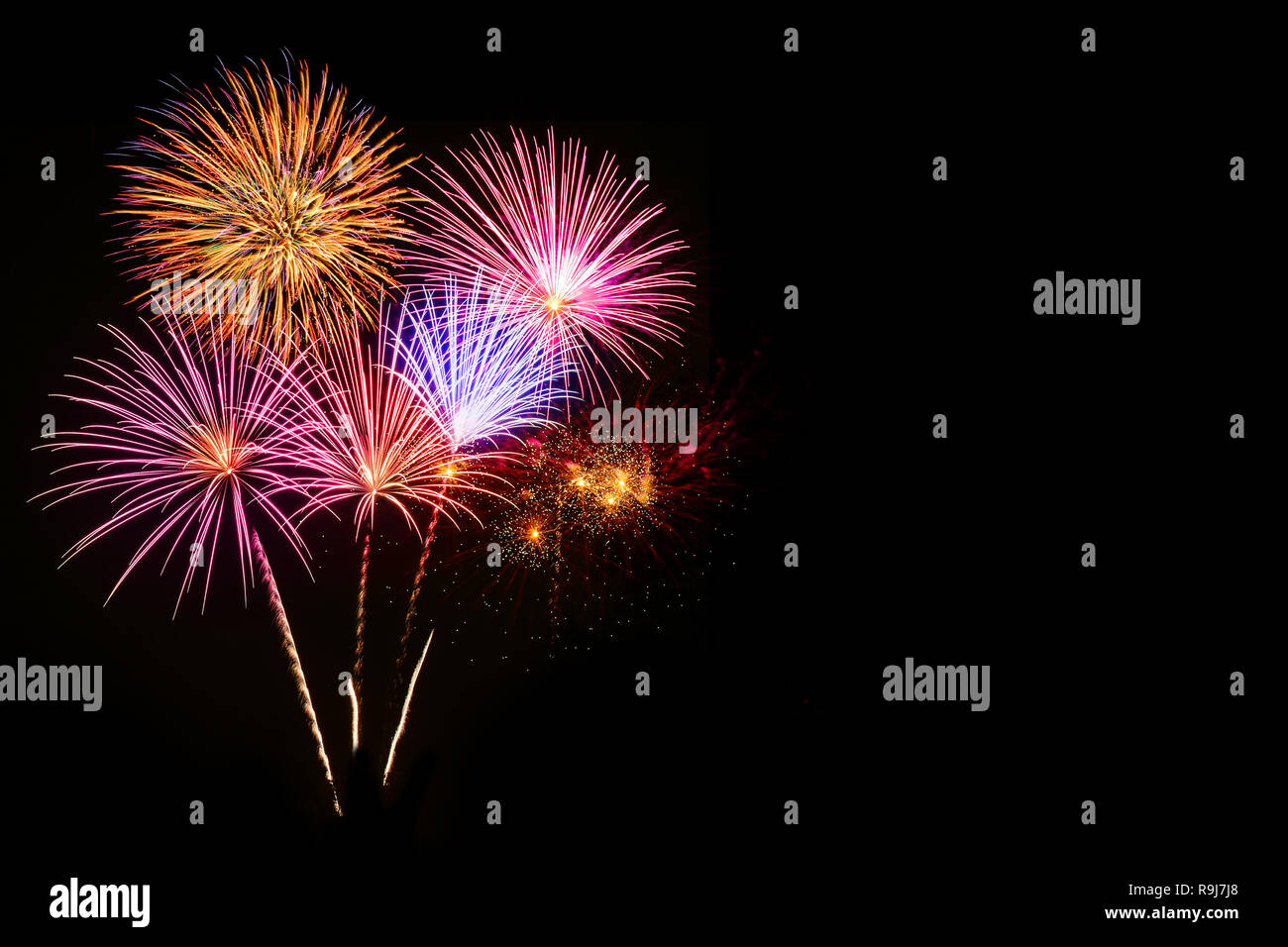 Colorful fireworks celebration and the night sky background Stock Photo ...