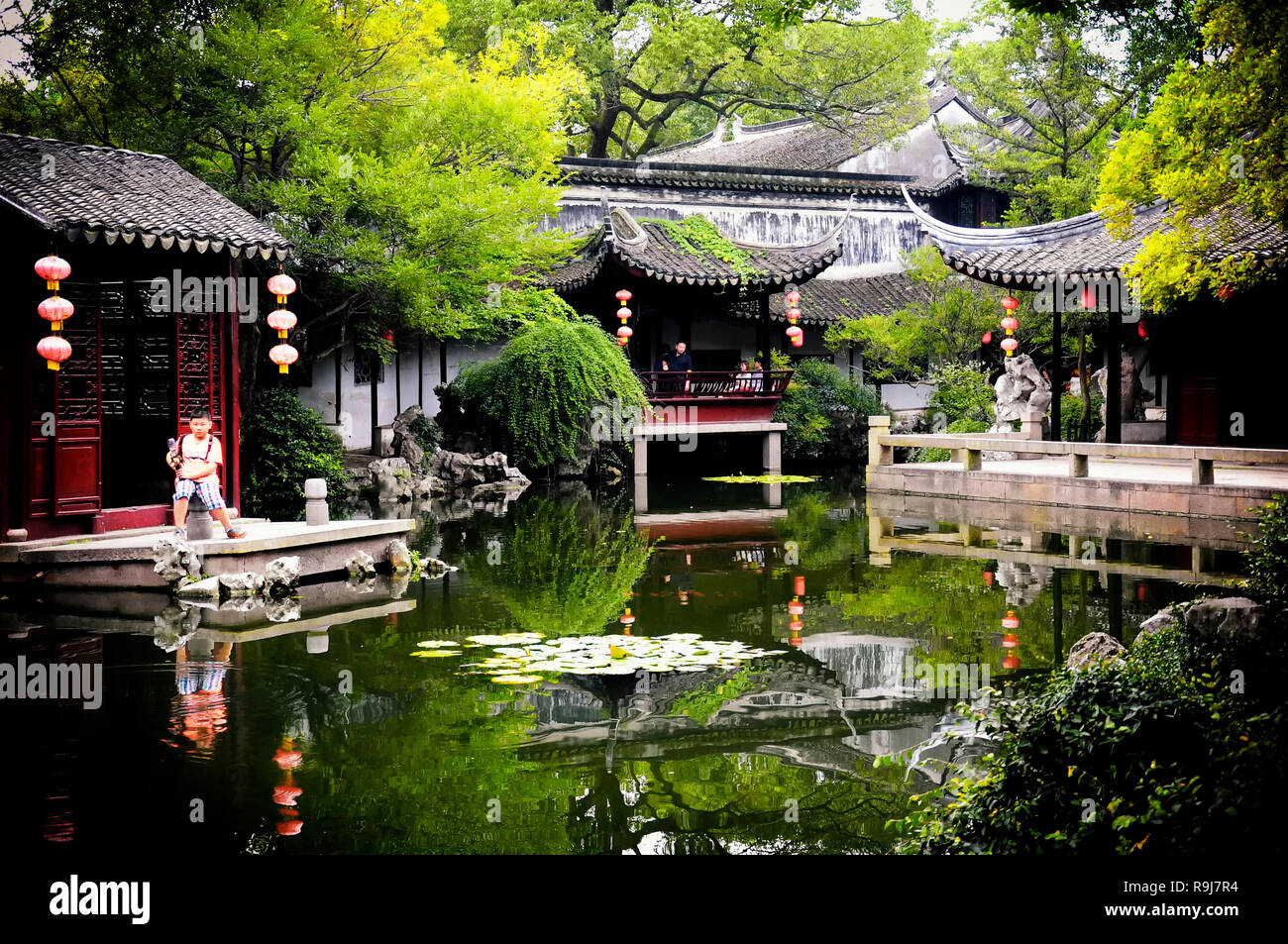 Tongli Water Town, China. July 25, 2015. Chinese architecture and classic garden within Tongli ...