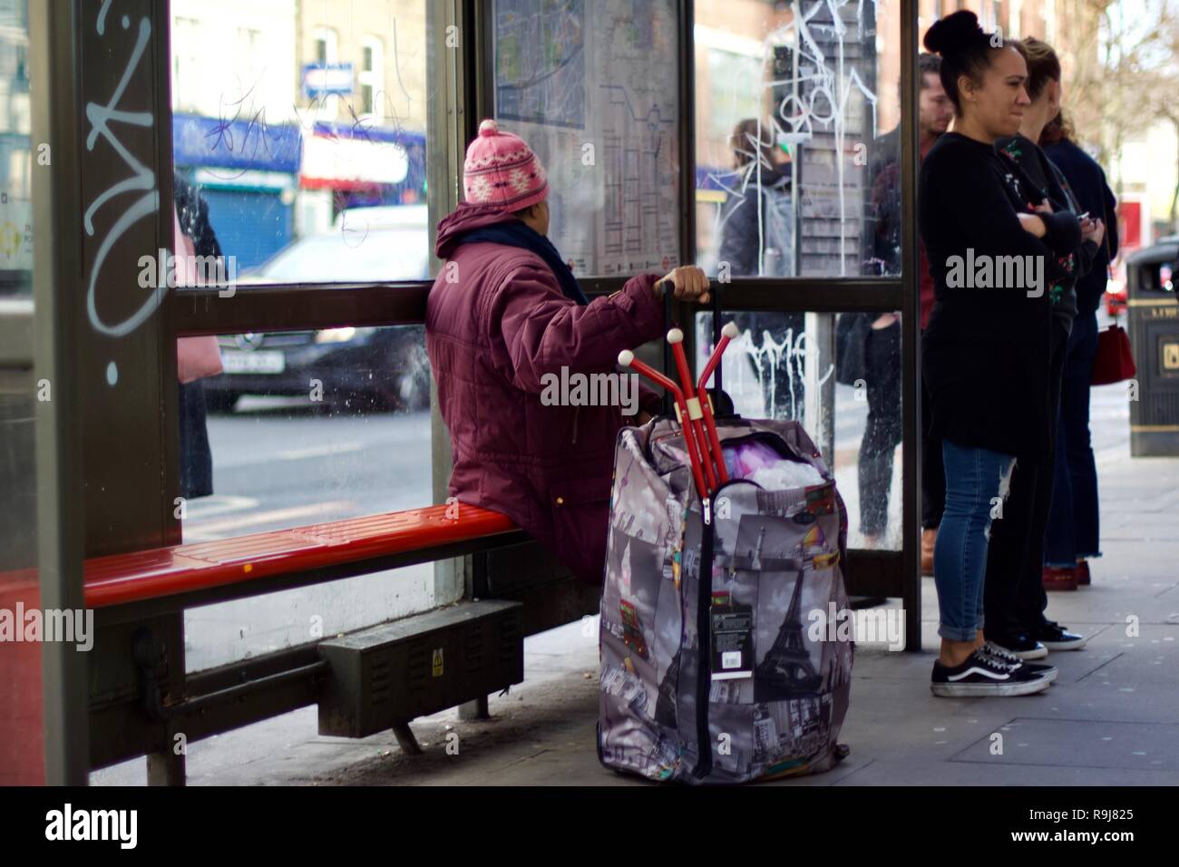 Waiting for a bus hi-res stock photography and images - Alamy