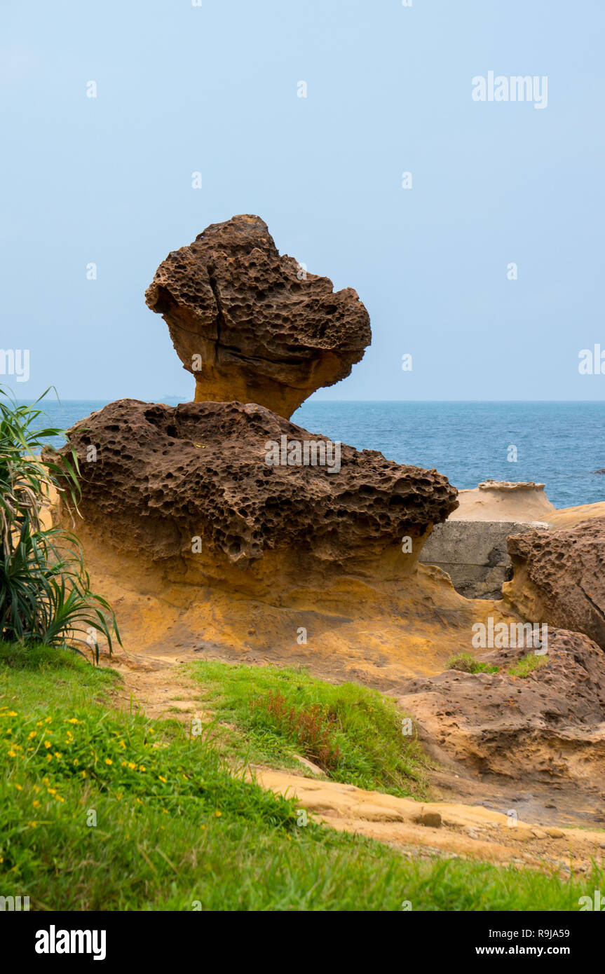 Unique geological formations at Yehliu Geopark in Taiwan on a sunny day ...