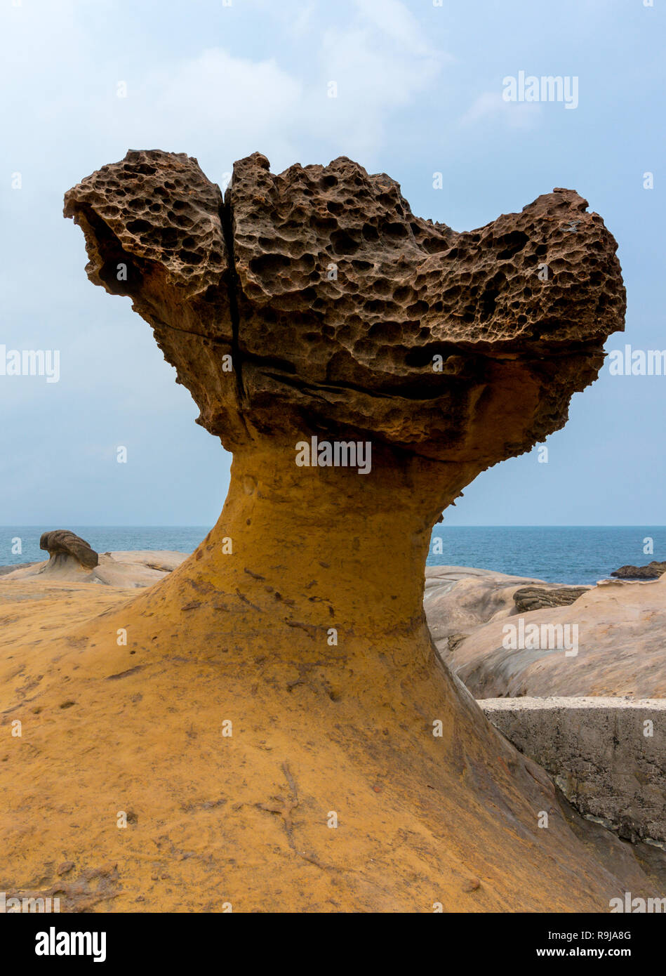 Unique geological formations at Yehliu Geopark in Taiwan on a sunny day ...