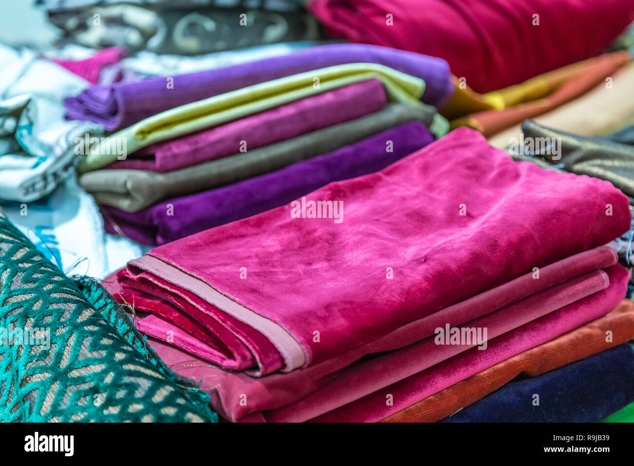 Touching fabrics hi-res stock photography and images - Alamy