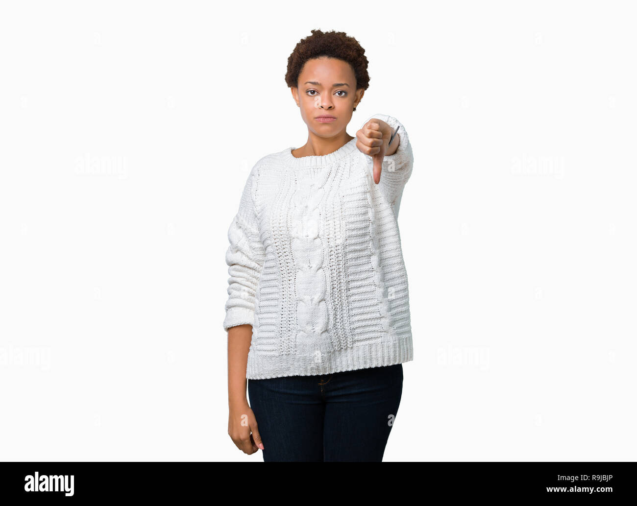 Beautiful young african american woman wearing sweater over isolated ...