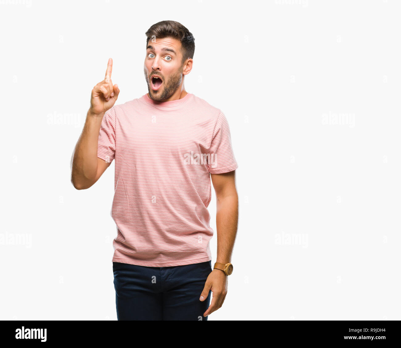 Young handsome man over isolated background pointing finger up with ...