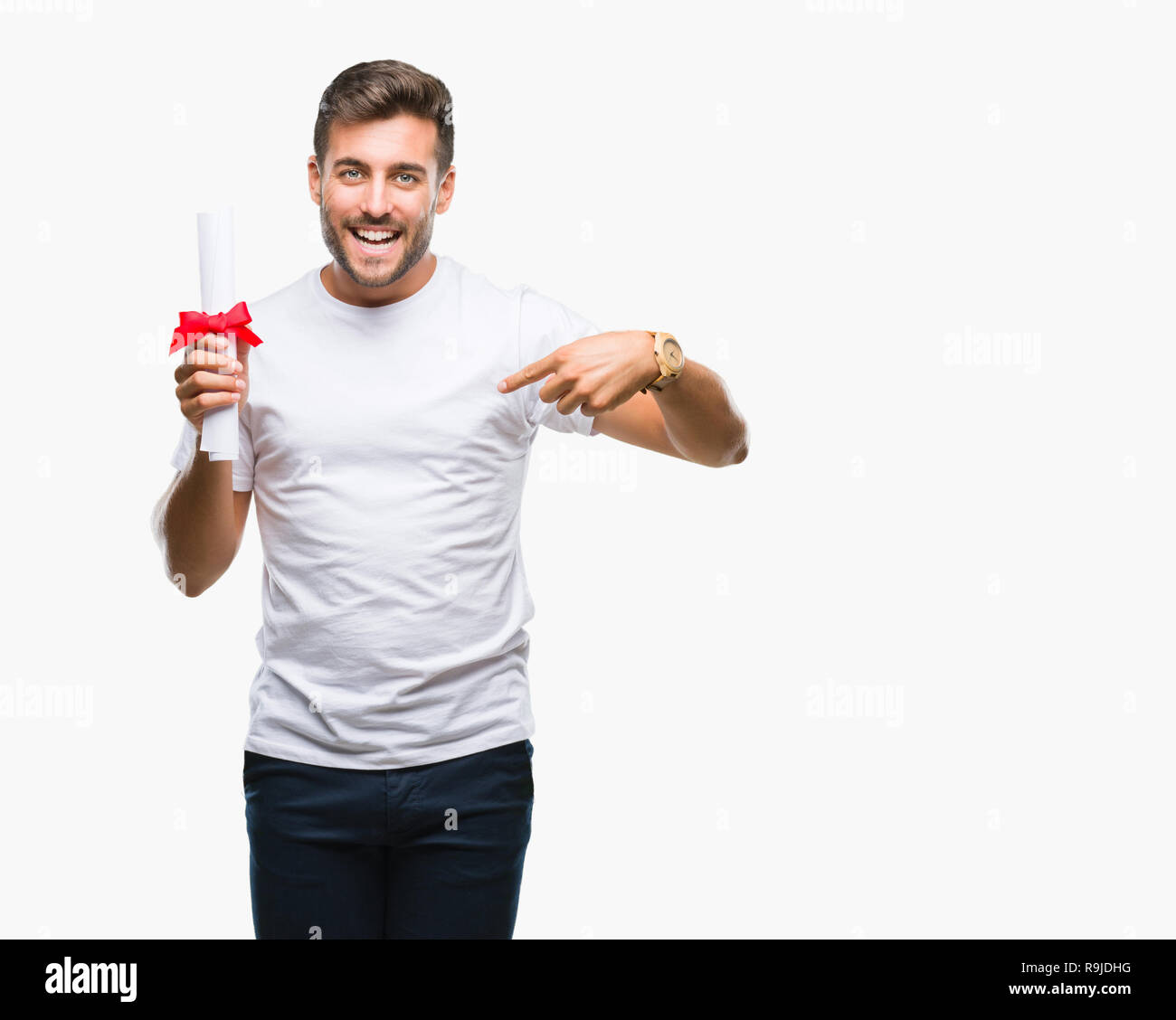 Young handsome man holding degree over isolated background with ...