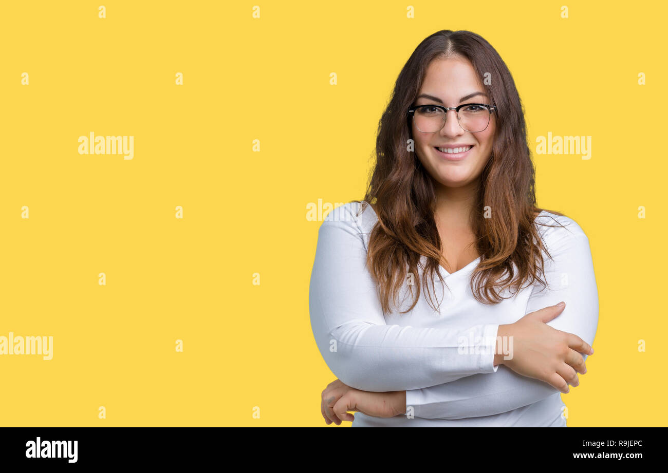 Beautiful plus size young woman over isolated background happy face ...