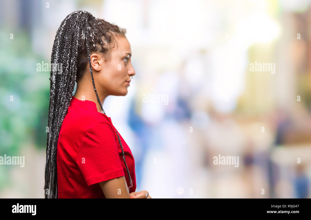 Young braided hair african american girl over isolated background ...