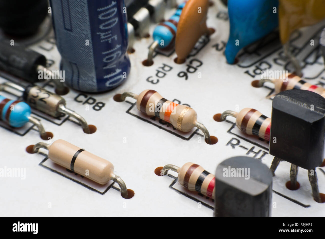 Resistor, Capacitor and Transistor on Circuit Board close up ...