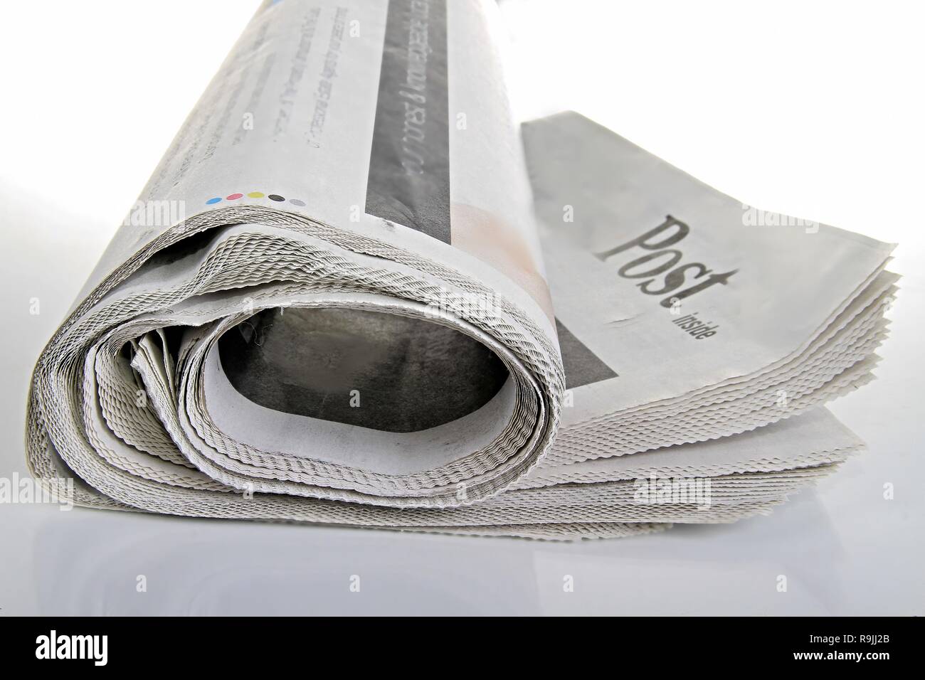 newspaper piled up on a table in a office no people stock photo Stock ...