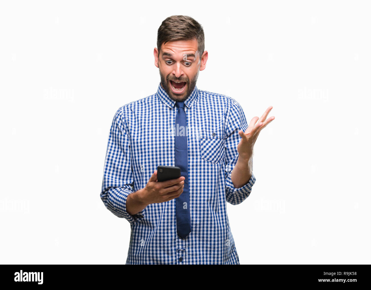 Young hadsome man texting sending message using smartphone over ...