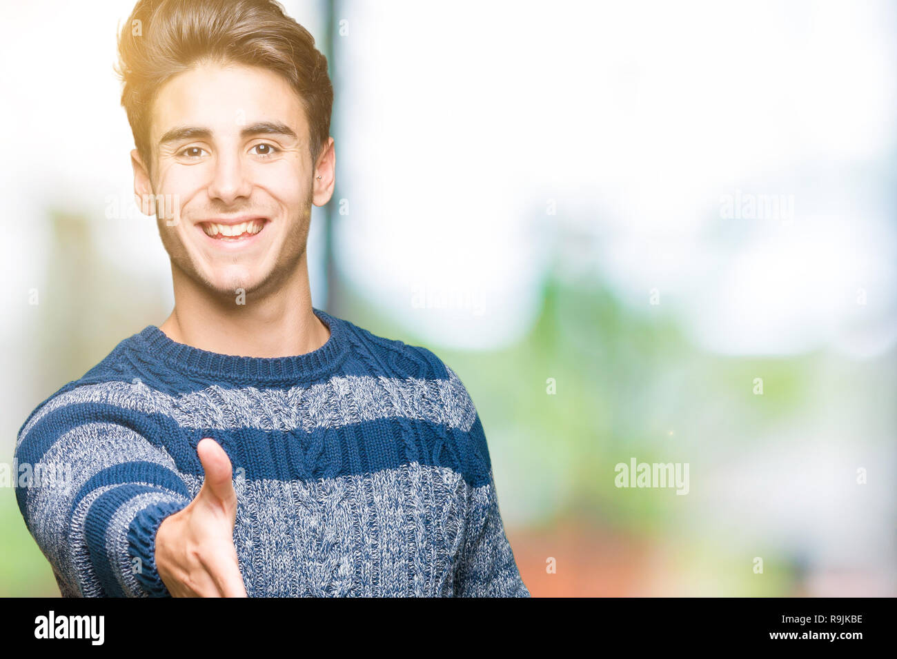 Handsome welcoming man smiling isolated hi-res stock photography and ...