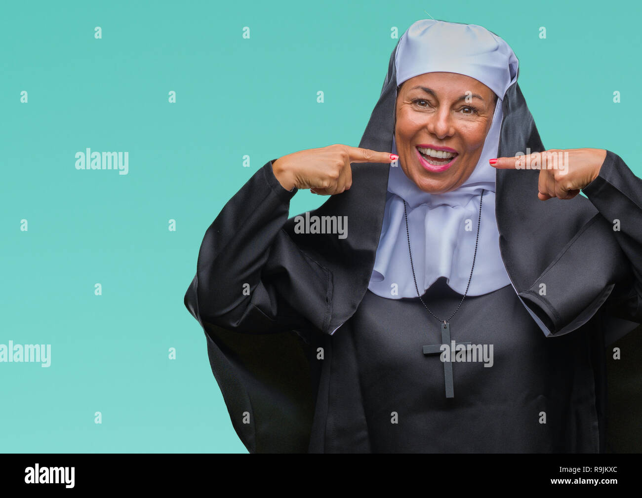 Smiling joyful nun hi-res stock photography and images - Alamy