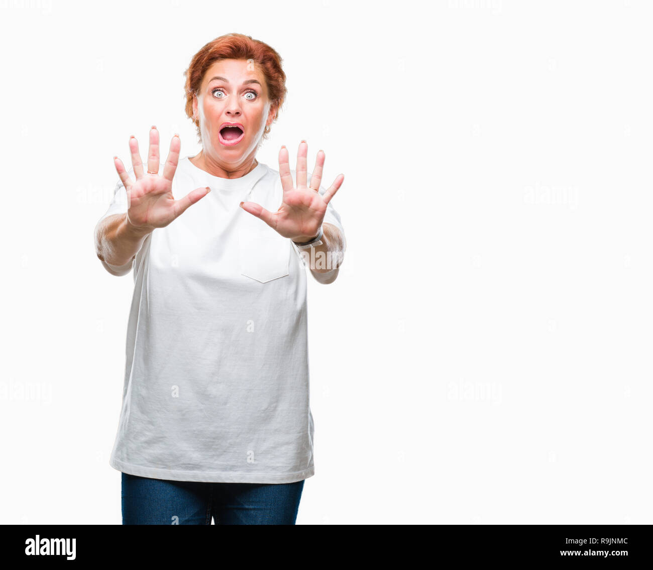 Atrractive senior caucasian redhead woman over isolated background ...