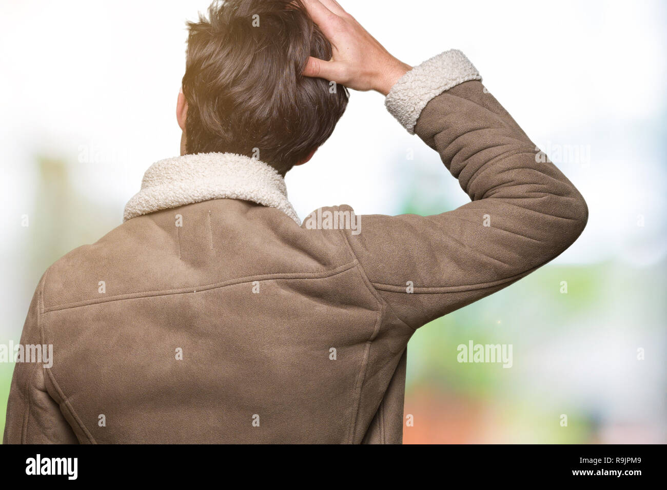 Blue coat over head hi-res stock photography and images - Alamy