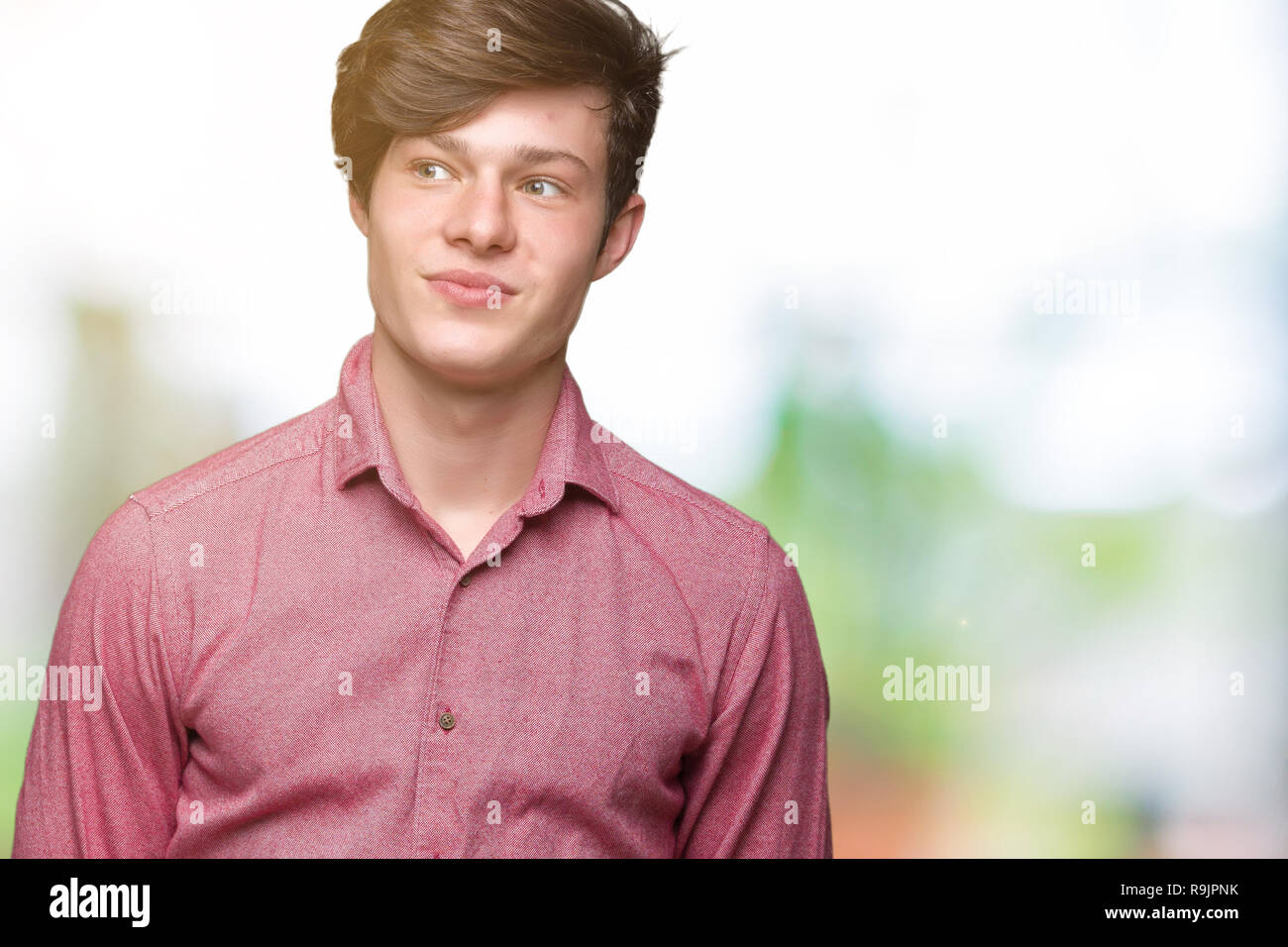 Young handsome business man over isolated background smiling looking ...