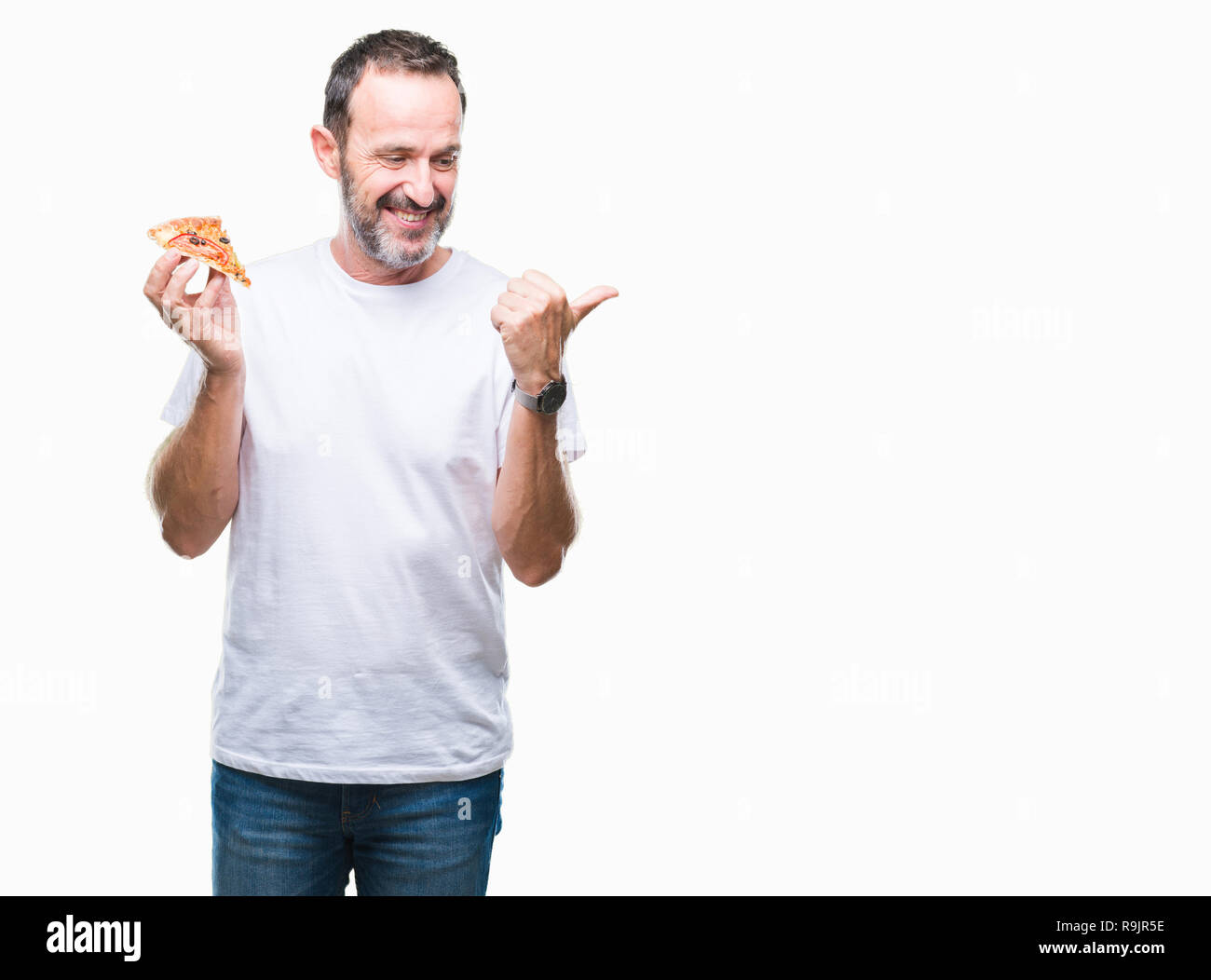 Middle age hoary senior man eating pizza slice over isolated background ...