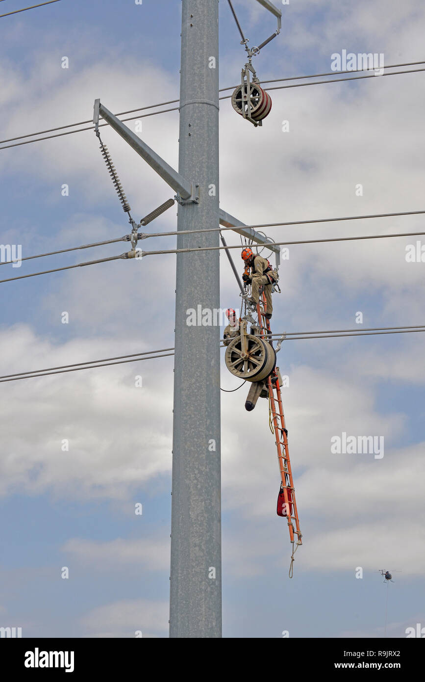Electrical Power Linemen Stock Photo - Alamy