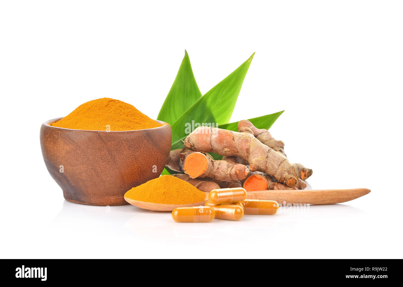 turmeric isolated on white background Stock Photo - Alamy