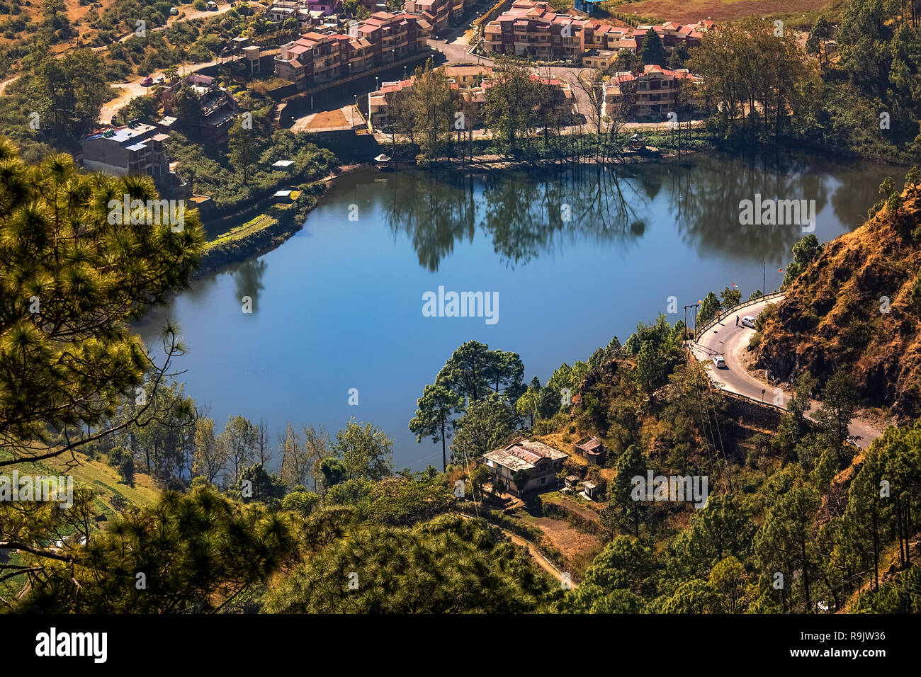 Aerial view of scenic mountain lake with cityscape as viewed from a ...