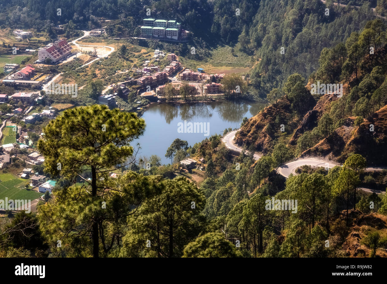 Aerial view of scenic mountain lake with cityscape as viewed from a ...