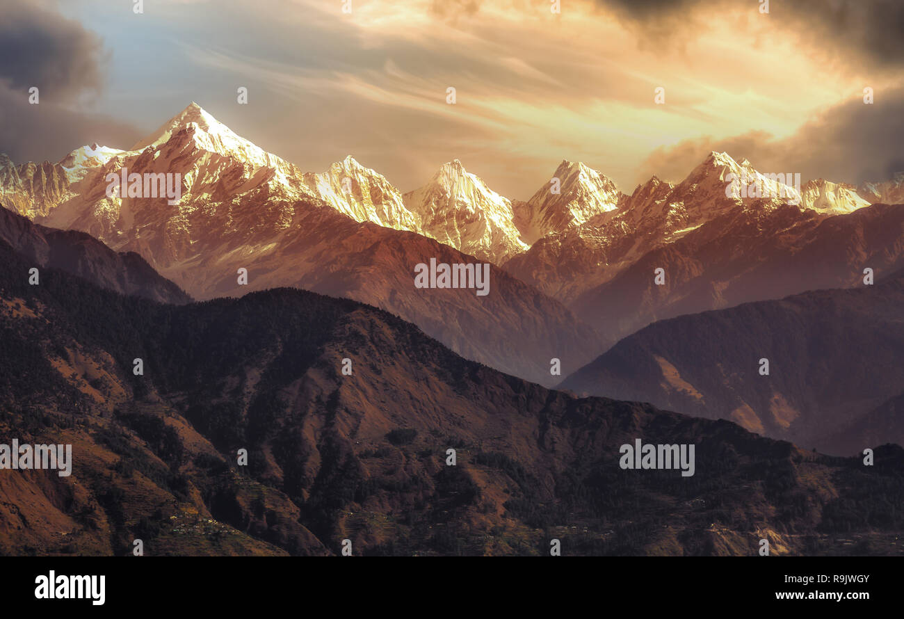 Panchchuli Himalaya snow peaks with golden hue at sunset as viewed from ...
