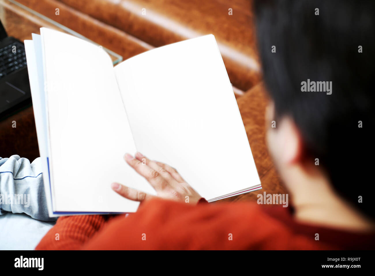 Picture of man is reading book Stock Photo - Alamy