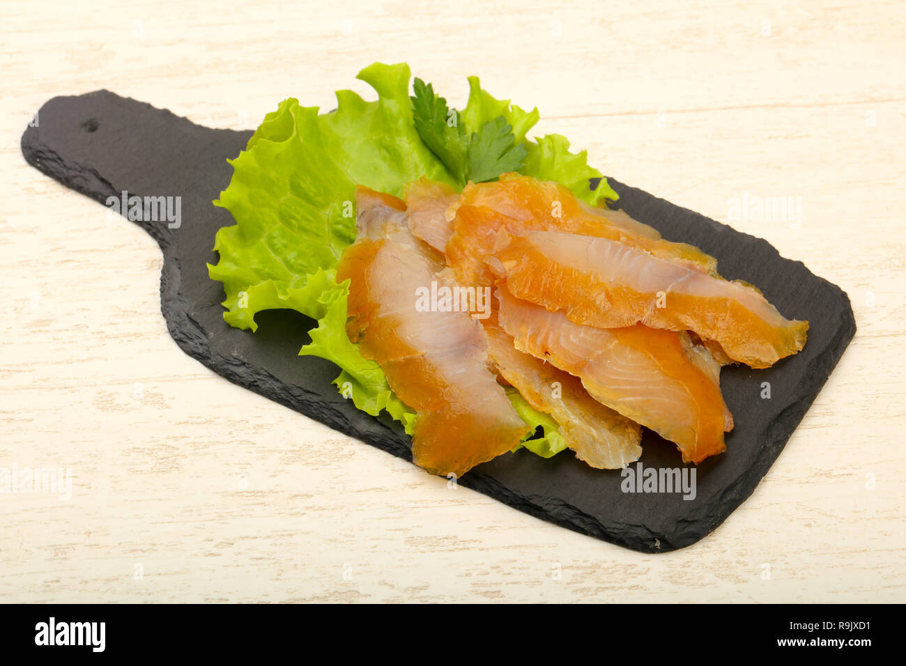 Smoked catfish fillet carpaccio Stock Photo - Alamy