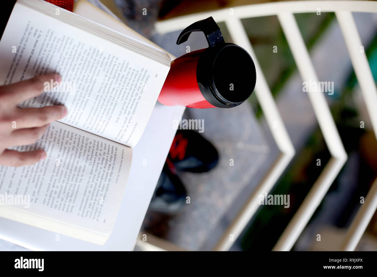 Boy reading at table hi-res stock photography and images - Alamy