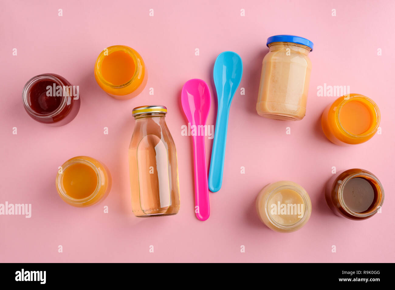 Juice, puree and spoons Stock Photo - Alamy