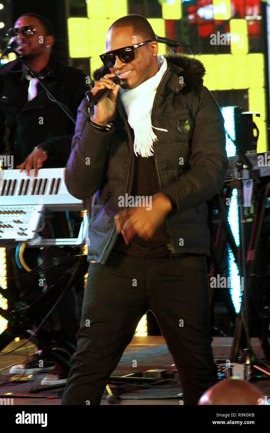 NEW YORK, NY - DECEMBER 31: Musical artist Taio Cruz performs on stage ...