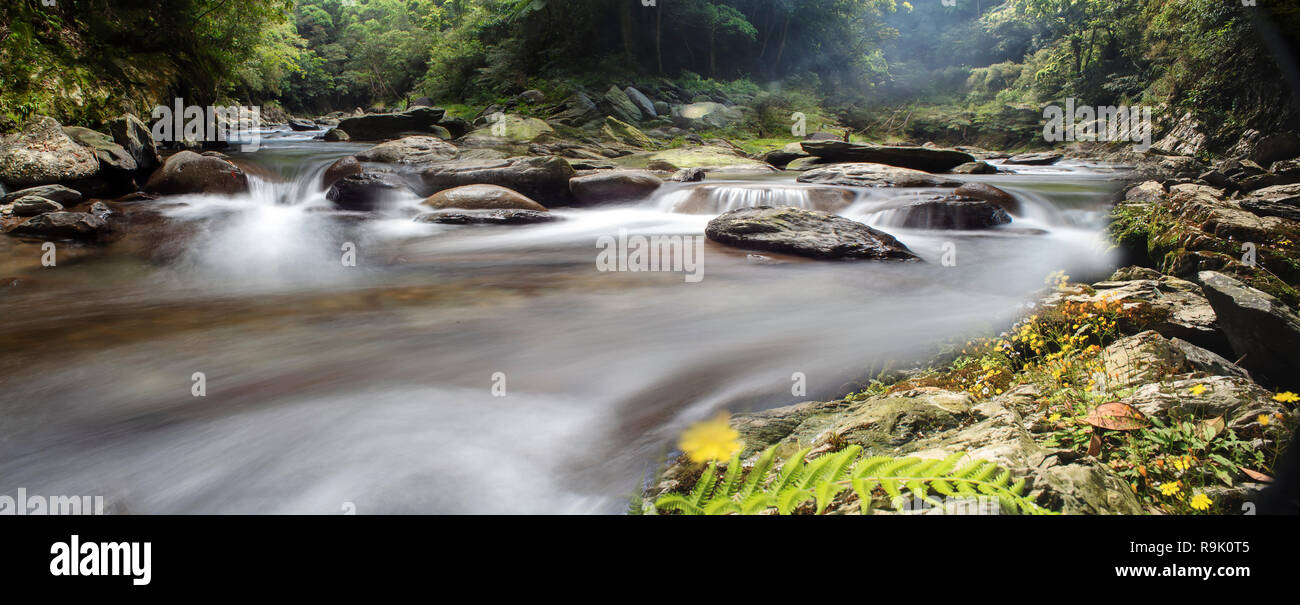 The Picture of some small waterfall at a nature river Stock Photo - Alamy
