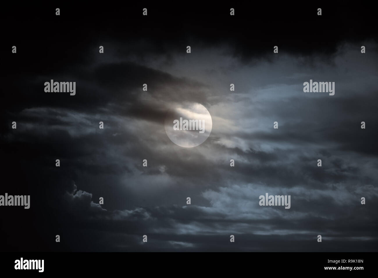 Dark overcast full moon night Stock Photo - Alamy