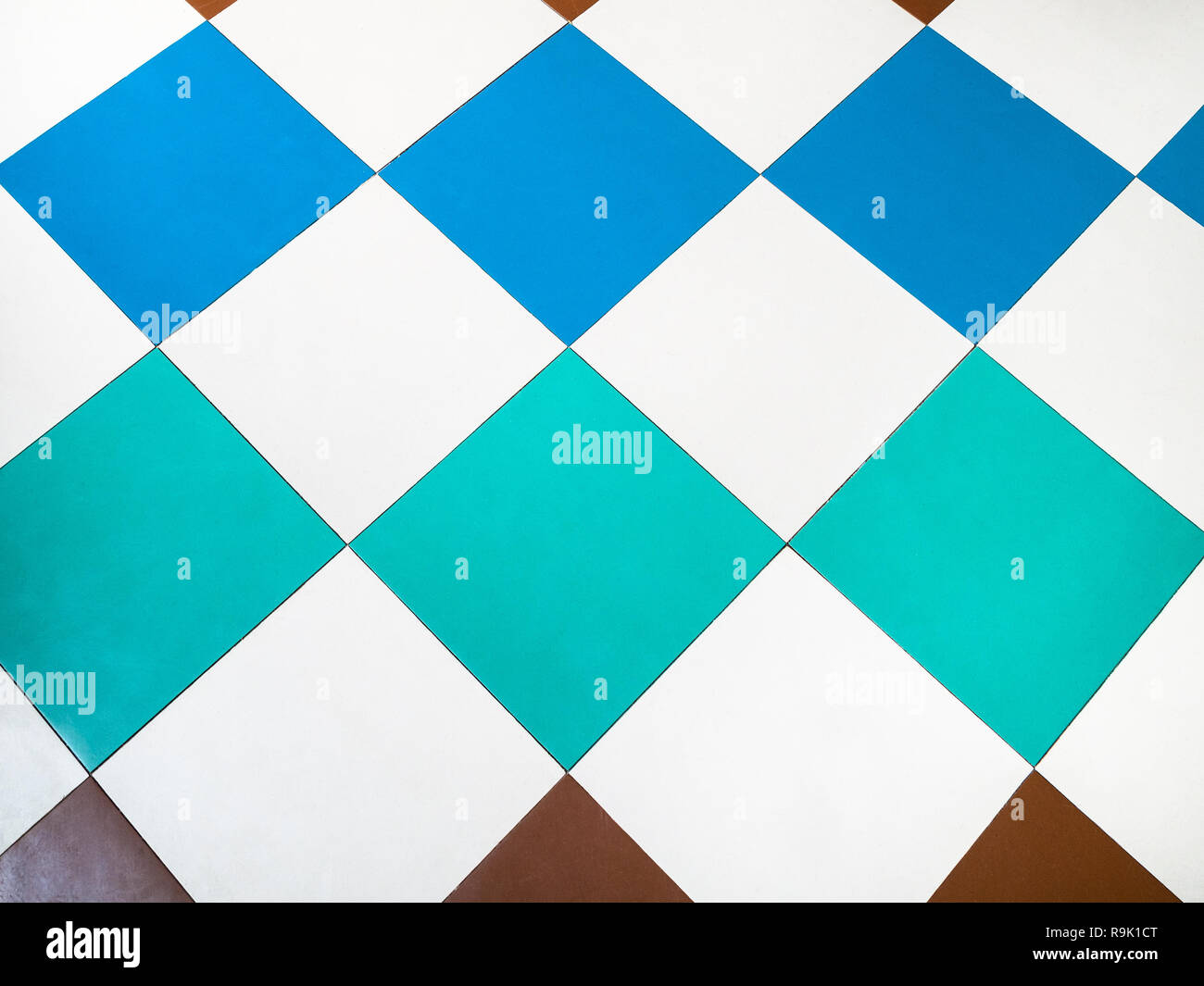 top view of mosaic floor from multicolored PVC tiles Stock Photo - Alamy