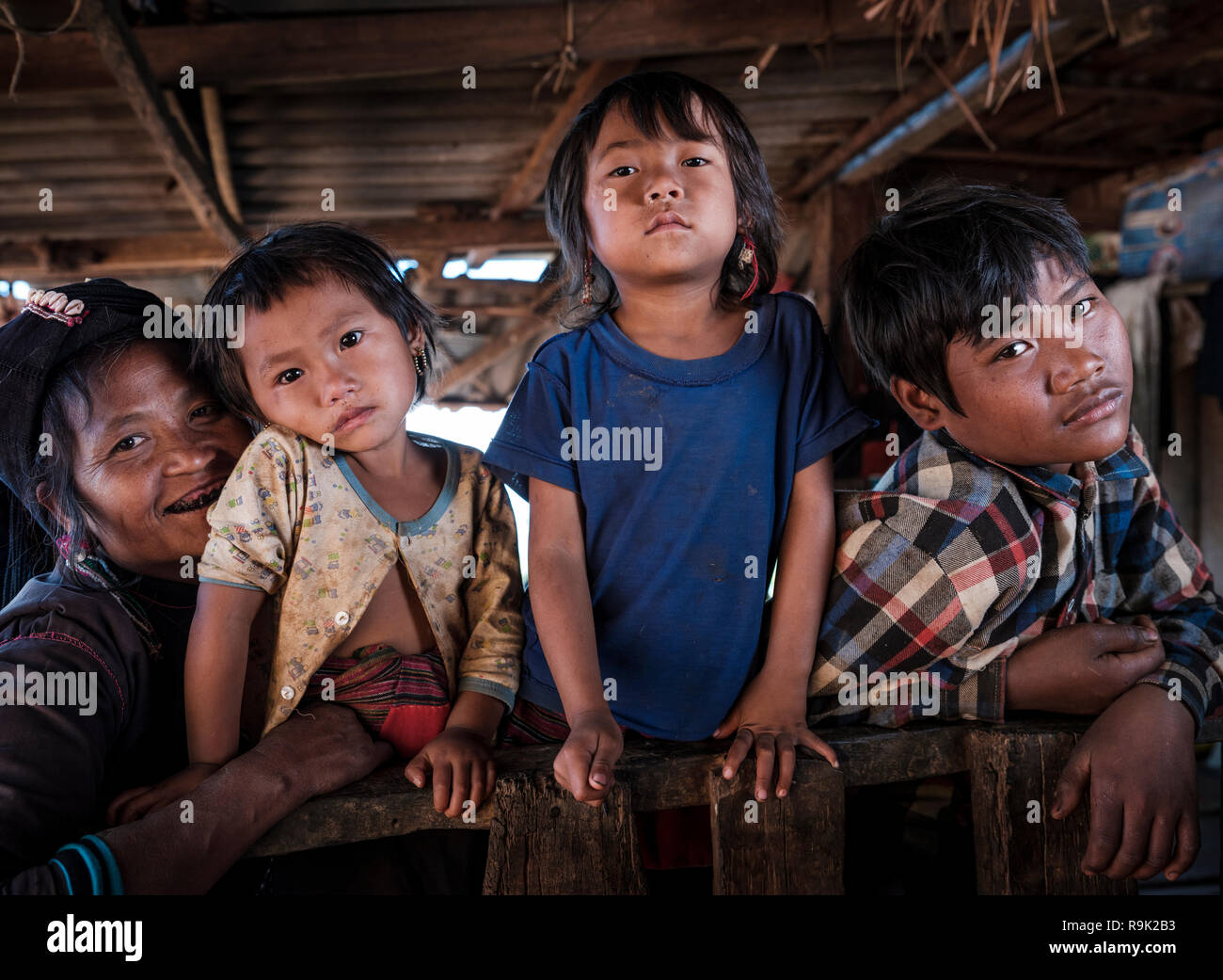 KYAING TONG, MYANMAR - CIRCA DECEMBER 2017: Portrait of a family at the ...