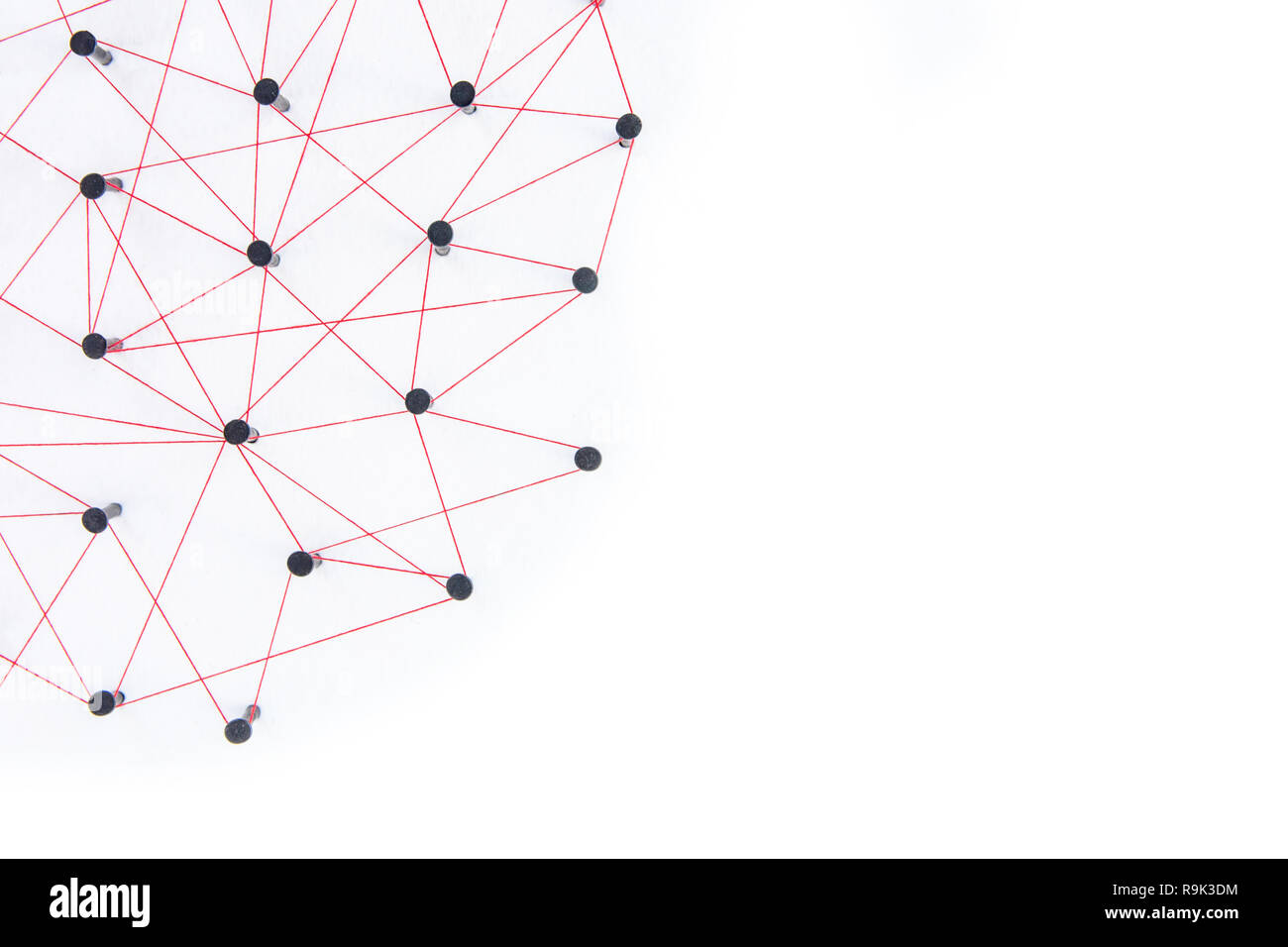 Connecting networks concept - network connected with yarn red on white ...