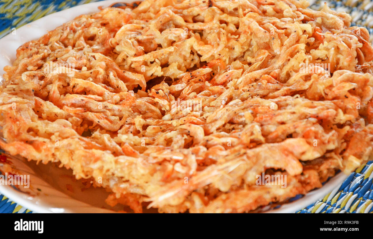 Tiny fried fish hi-res stock photography and images - Alamy