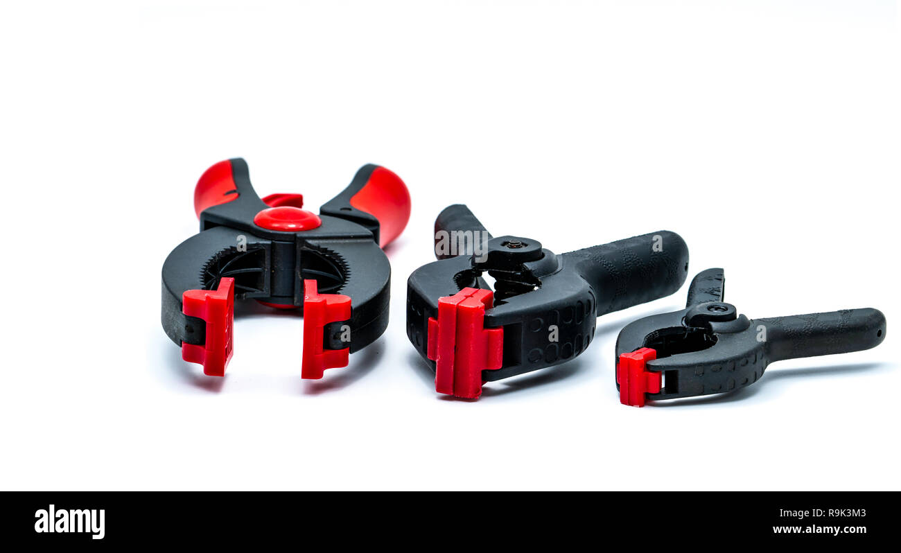 Black and orange spring clamp isolated on white background. Set of ...