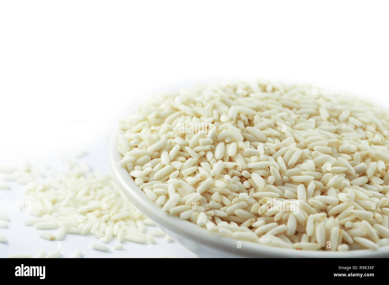 rice in cup on white background / raw white Jasmine rice dry for food ...
