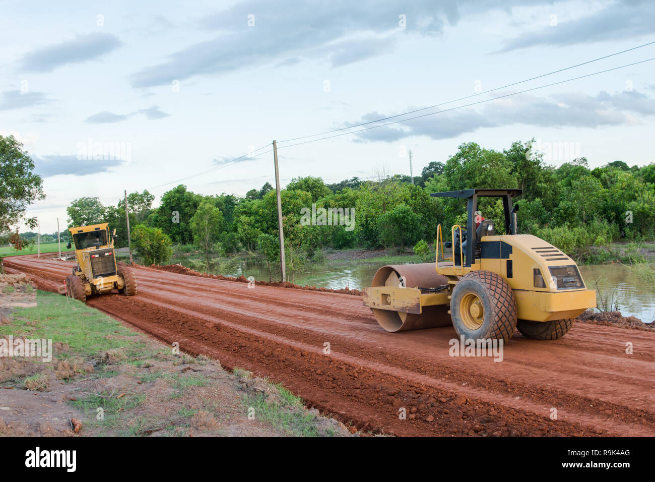 Roller steamroller or vibratory roller machine and motor graderworking ...