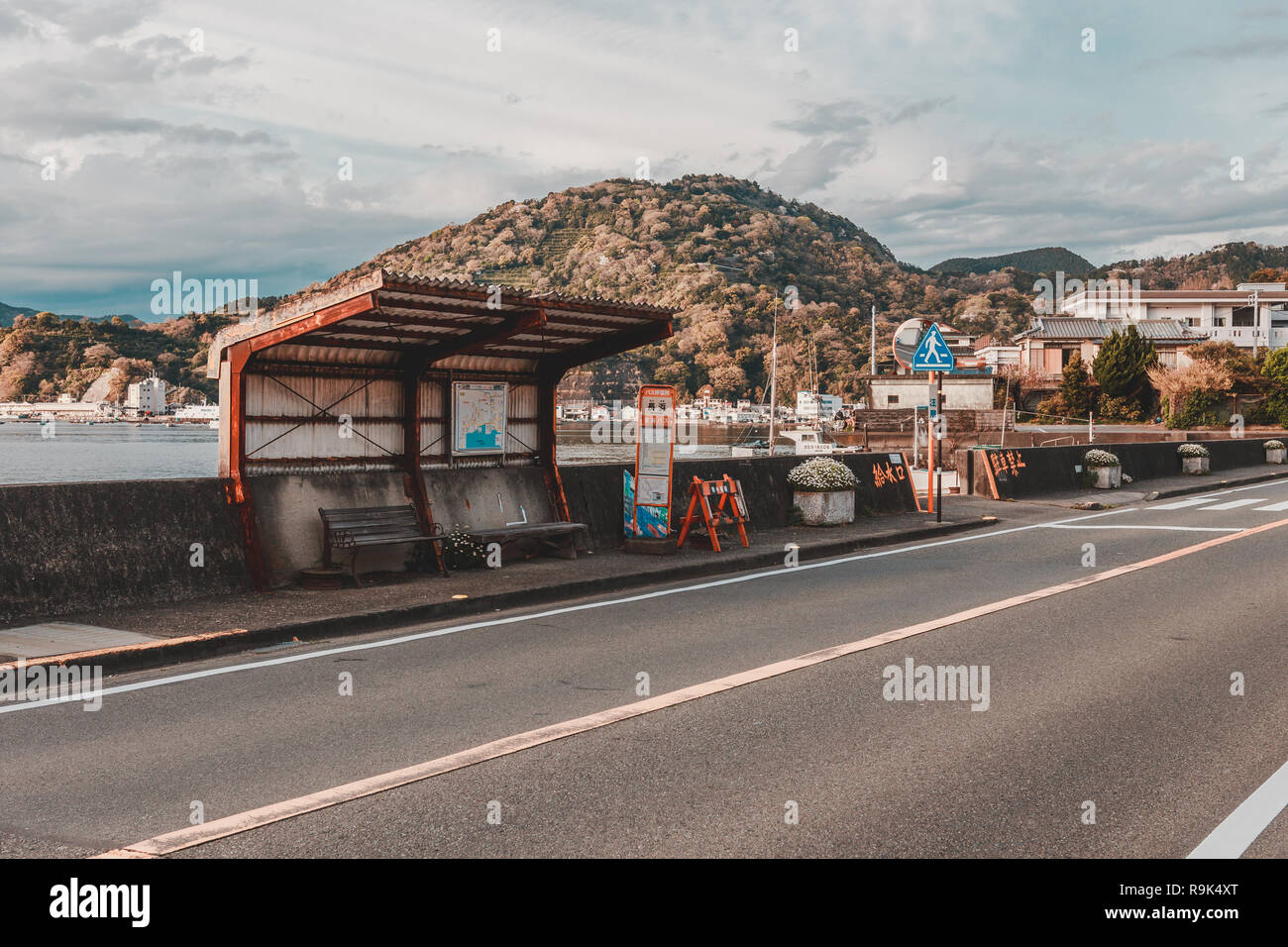 a Japanese bus stop in Uchiura, Numazu with Uchiura bay in the ...