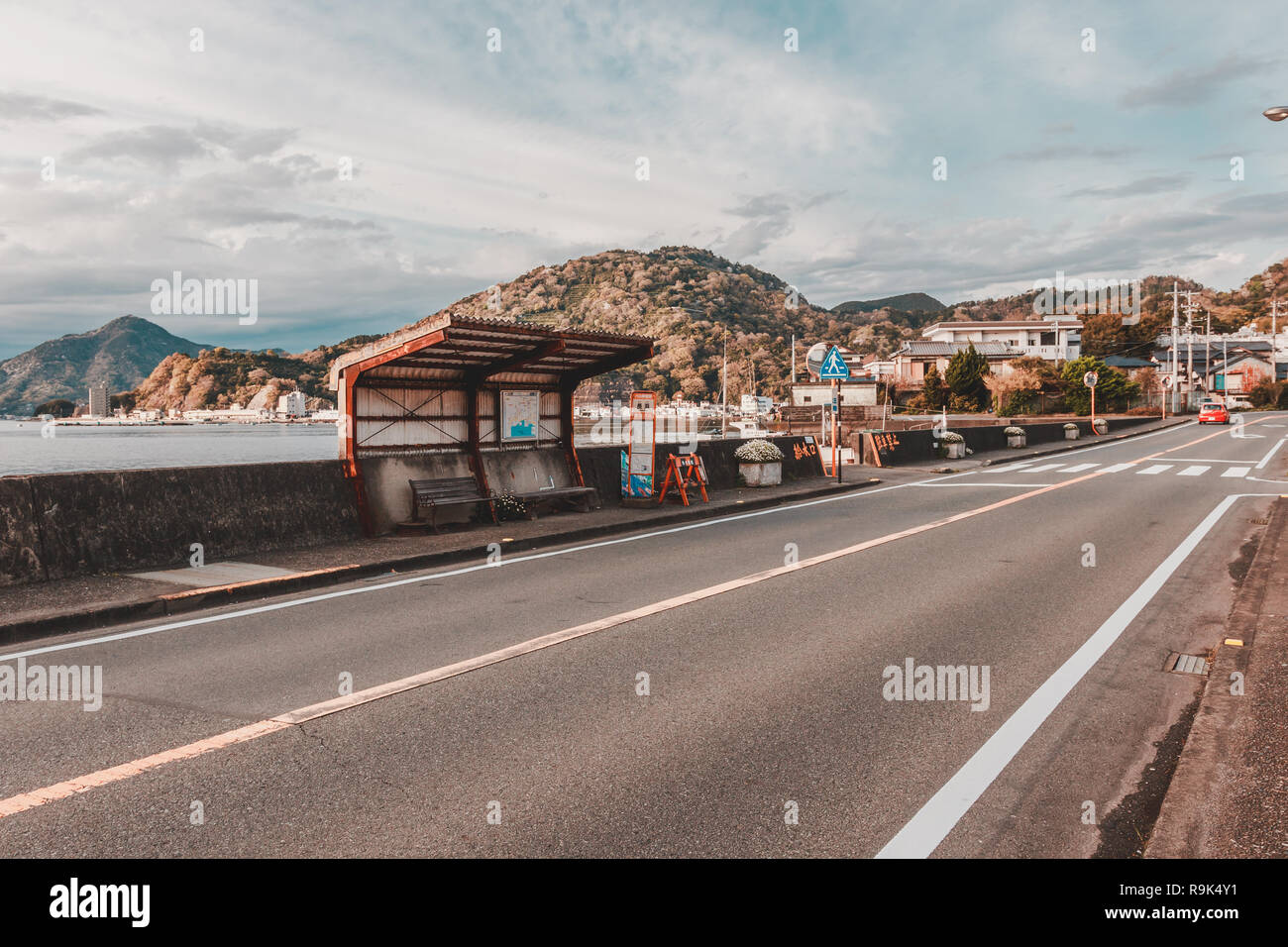 a Japanese bus stop in Uchiura, Numazu with Uchiura bay in the ...