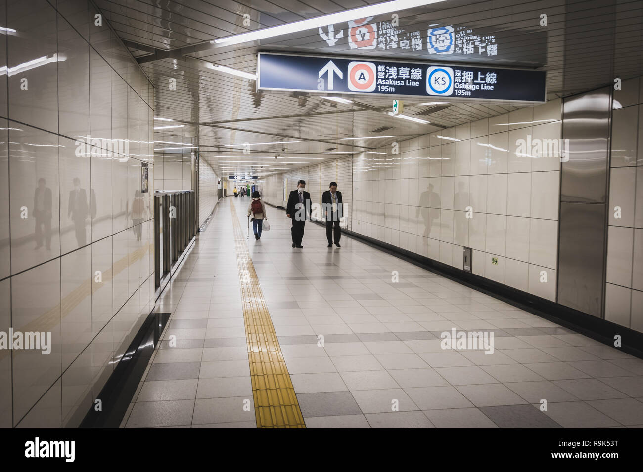 Tokyo Subway station sign showing way to Asakura Line and Oshiage Line ...