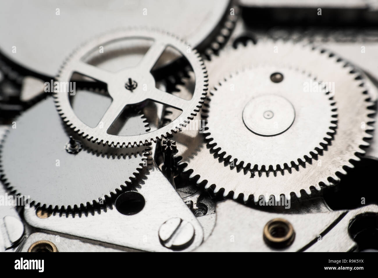 Mechanical watch / Gear Clock. Close up cogs and gears inside clock ...