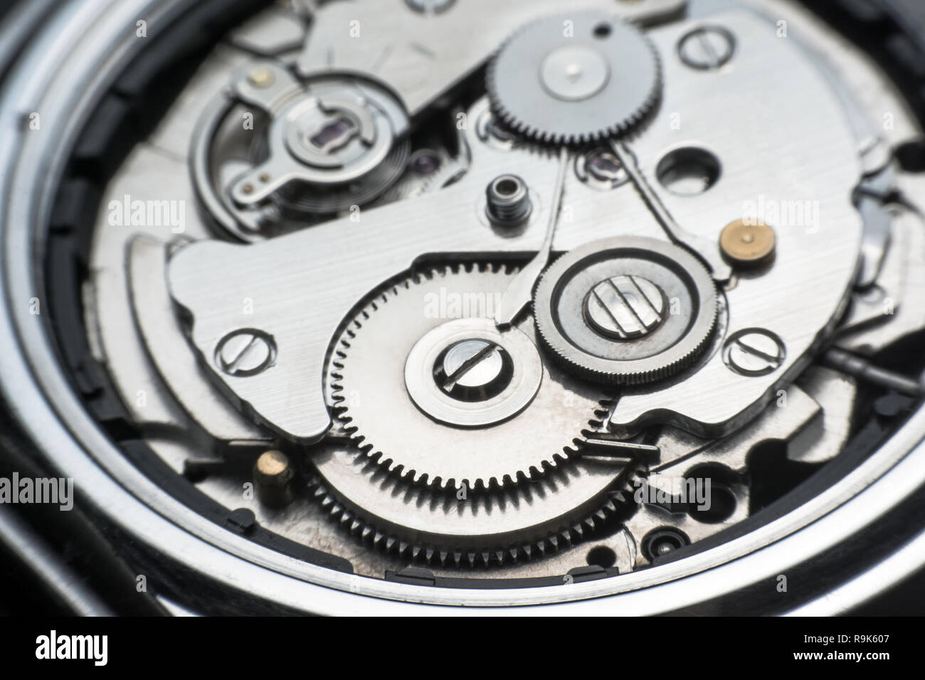 Mechanical watch / Gear Clock. Close up cogs and gears inside clock ...