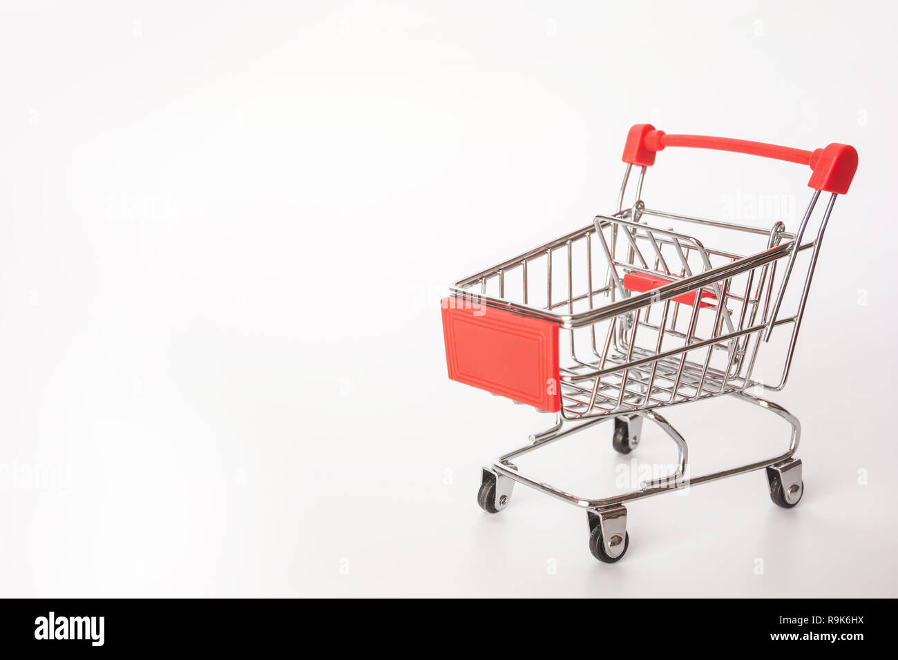 Red Shopping cart or supermarket cart on white background with copy ...