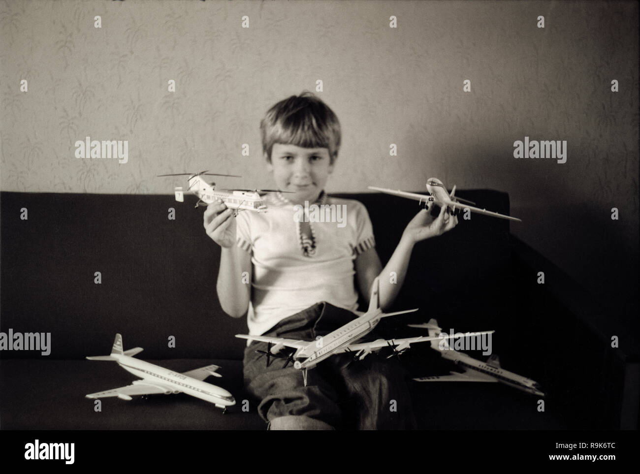 Teenage boy with model airplane hi-res stock photography and images - Alamy