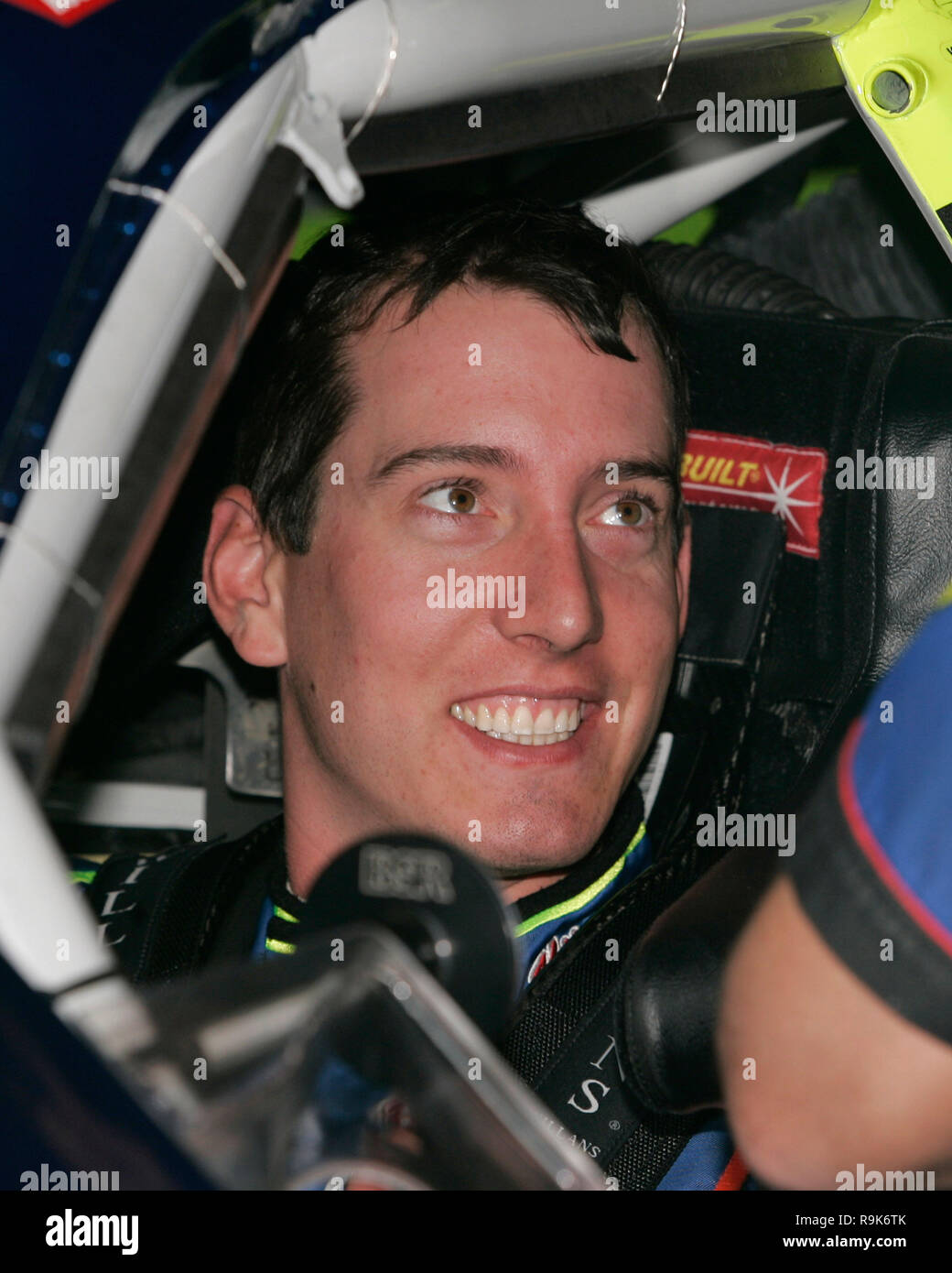 Kyle Busch waits in his car for the Nextel Cup Practice to begin at ...