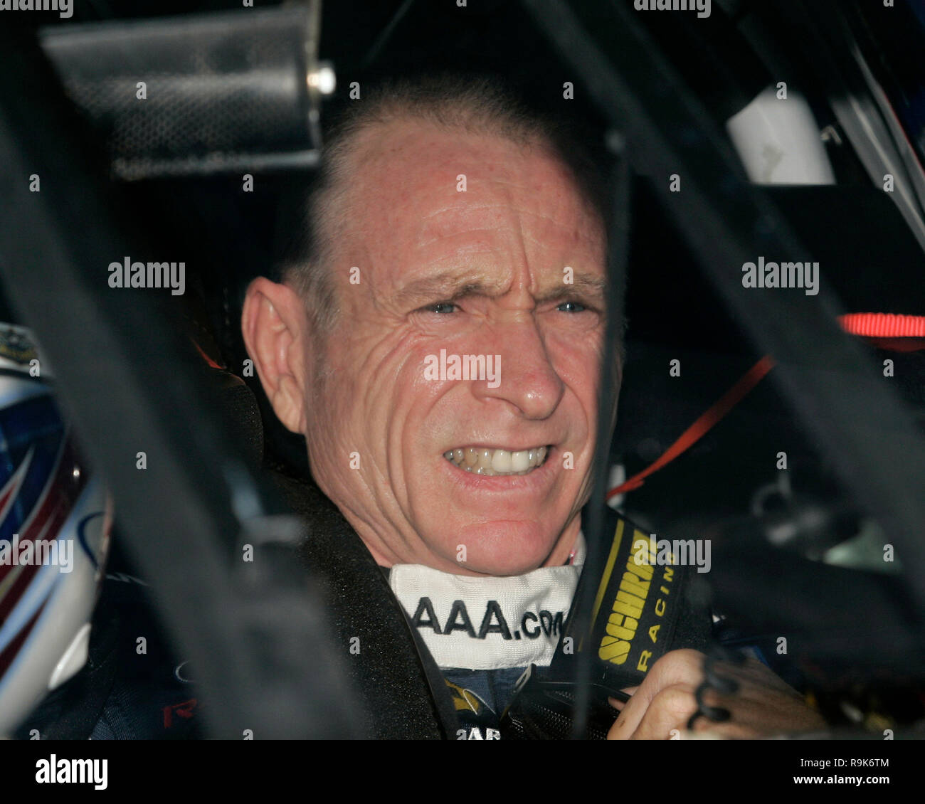 Mark Martin waits in his car for the Nextel Cup Practice to begin at ...