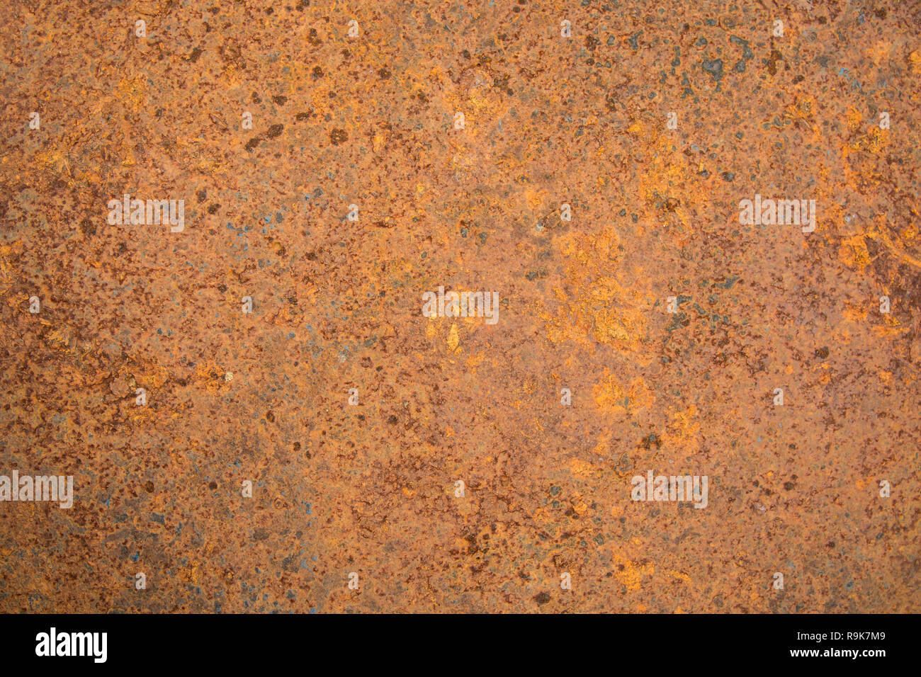 Brown rust stains texture of the old white paint on rusty metal wall ...