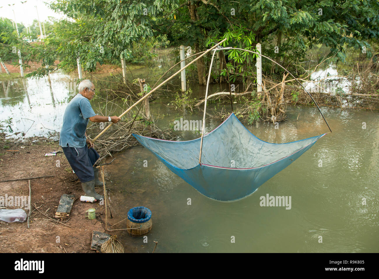 Old man with fish hi-res stock photography and images - Alamy